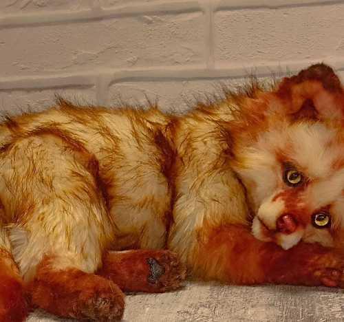 Реалистичная игрушка собака