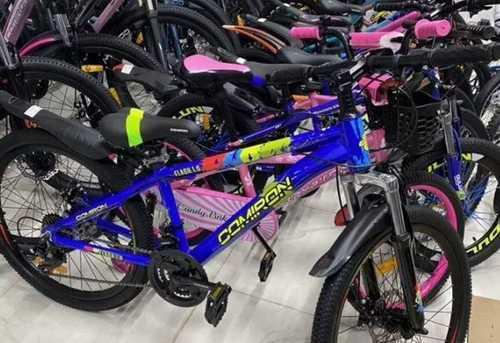 Детский велосипед с дополнительными колесиками