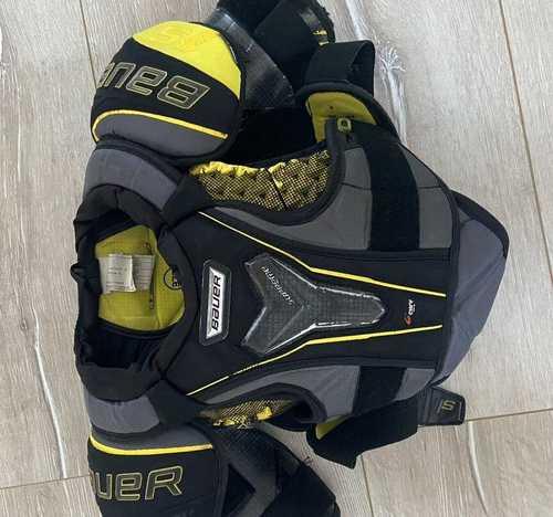 Хоккеейный нагрдуник bauer supreme 1s JR размер L