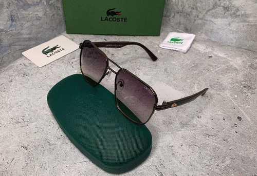 Солнцезащитные очки Lacoste с футляром