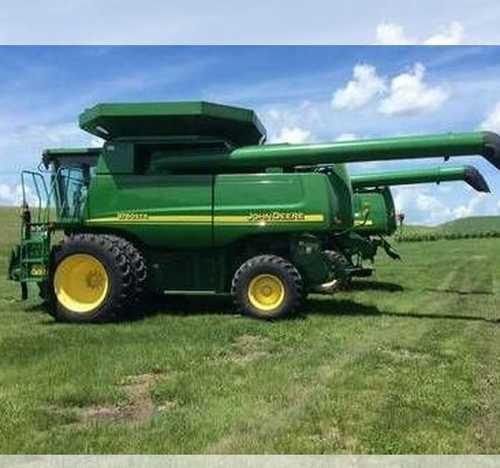 В разборе сельхозтехника John Deere