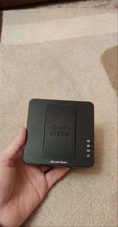 Cisco SPA122 ATA with Router