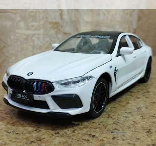 Модель автомобиля BMW manhart M8 белый