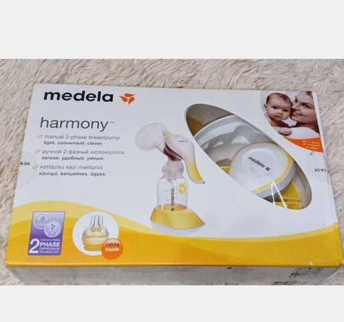 Молокоотсос medela ручной