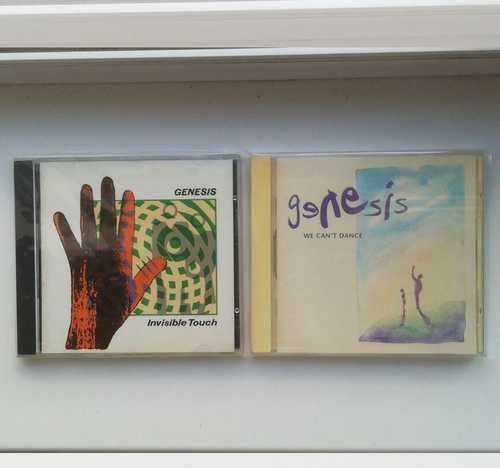 Genesis- фирменные компакт-диски
