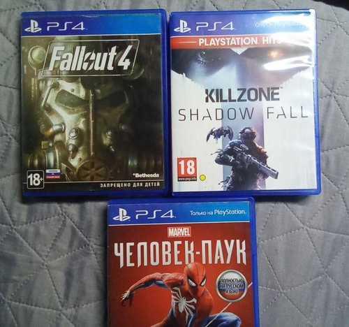 Диски на ps4 fallout, spider men, kill zone