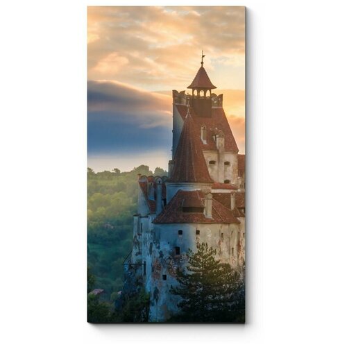 Модульная картина Средневековый замок Дракулы Бран в свете заката40x80