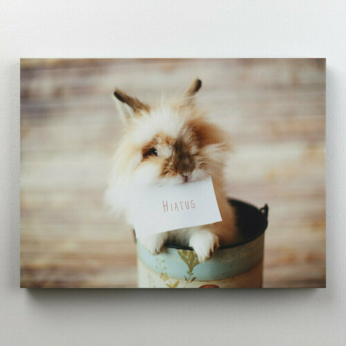 Интерьерная картина на холсте "Пушистый кролик в корзинке" размер 60x45 см