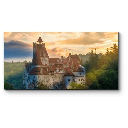 Модульная картина Средневековый замок Дракулы Бран в свете заката70x35