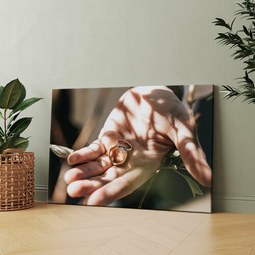 Картина на холсте (Золотое обручальное кольцо на руке) 30x40 см. Интерьерная, на стену.